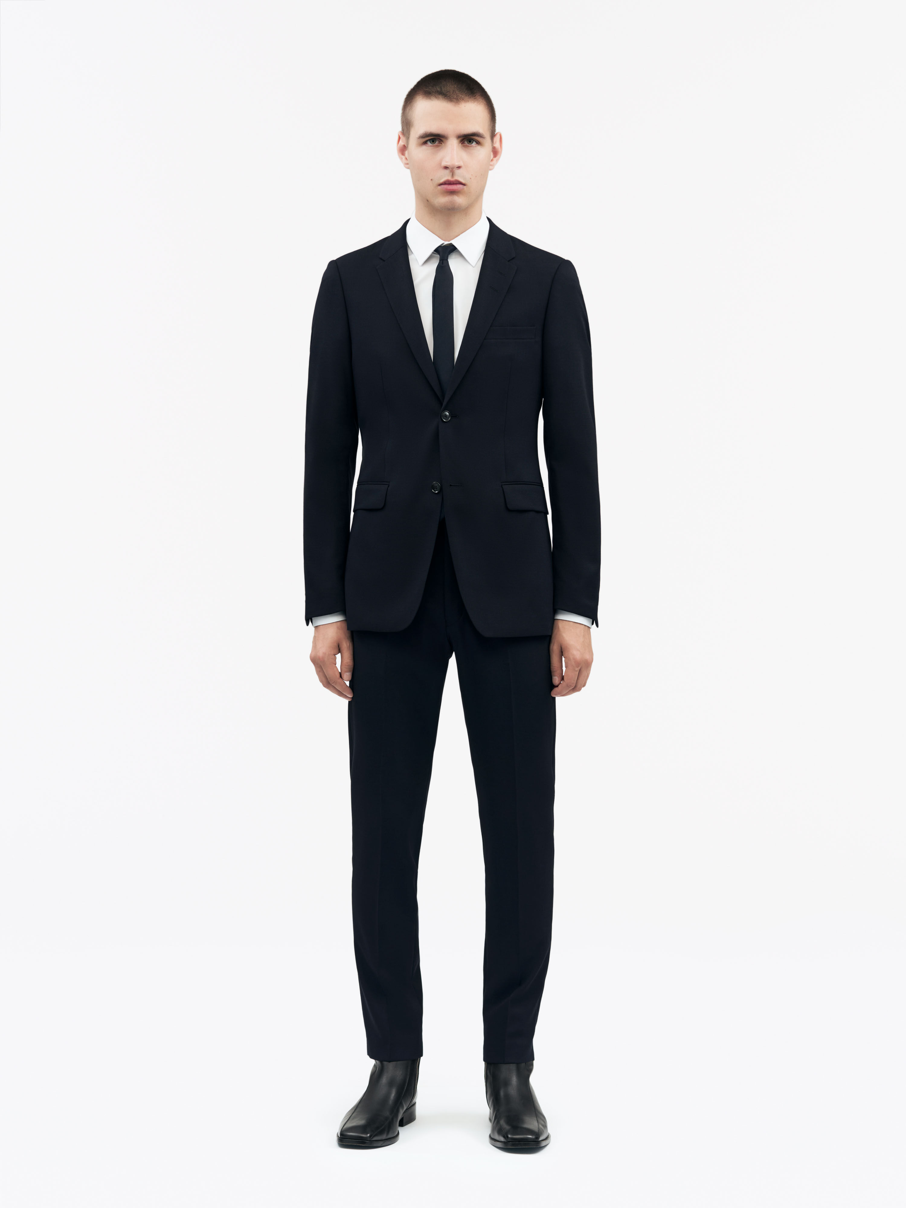 Suits - See all designer suits online at Tiger of Sweden